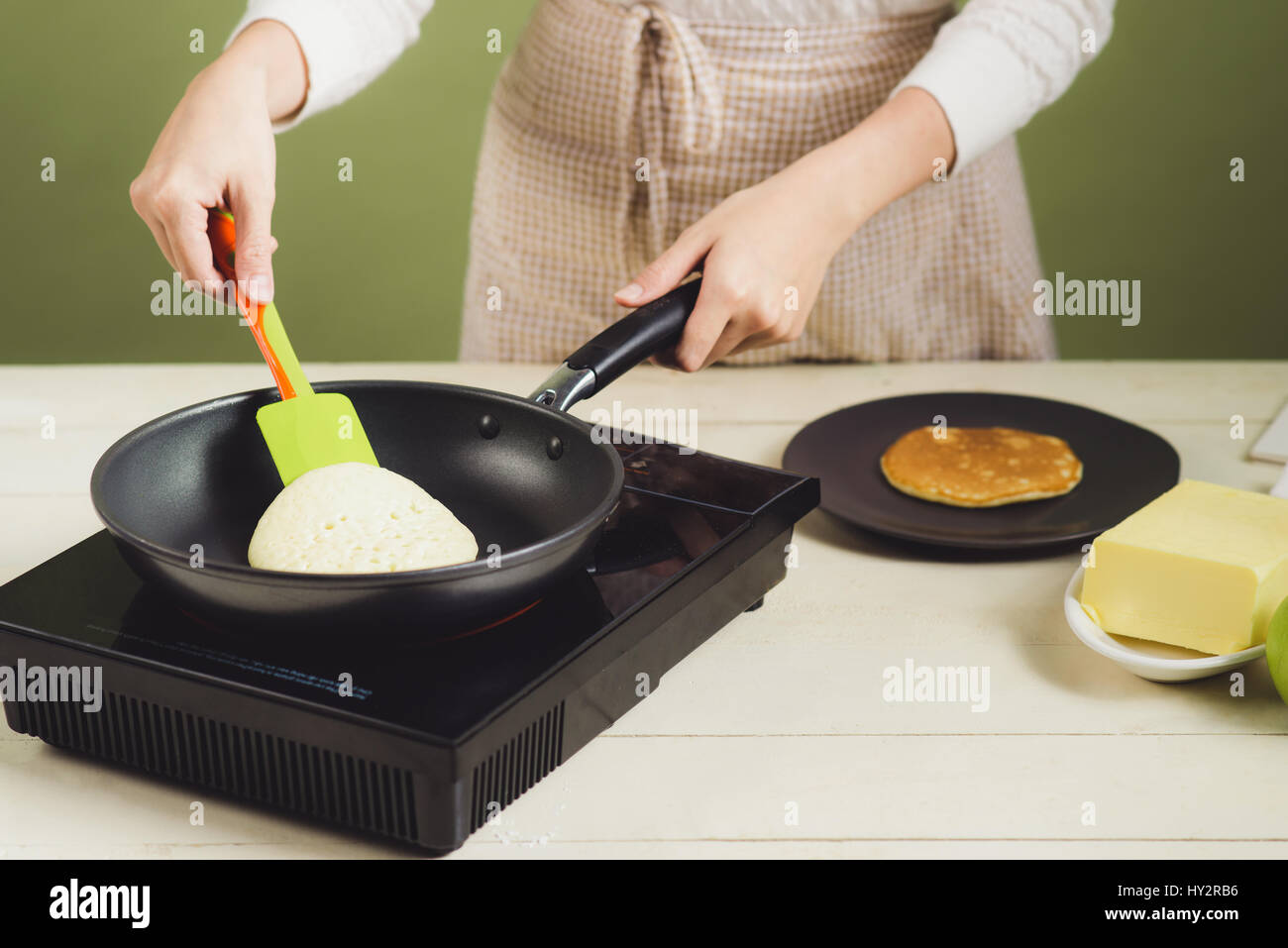 House wife wearing apron making. Steps of making cooking pancake Stock ...