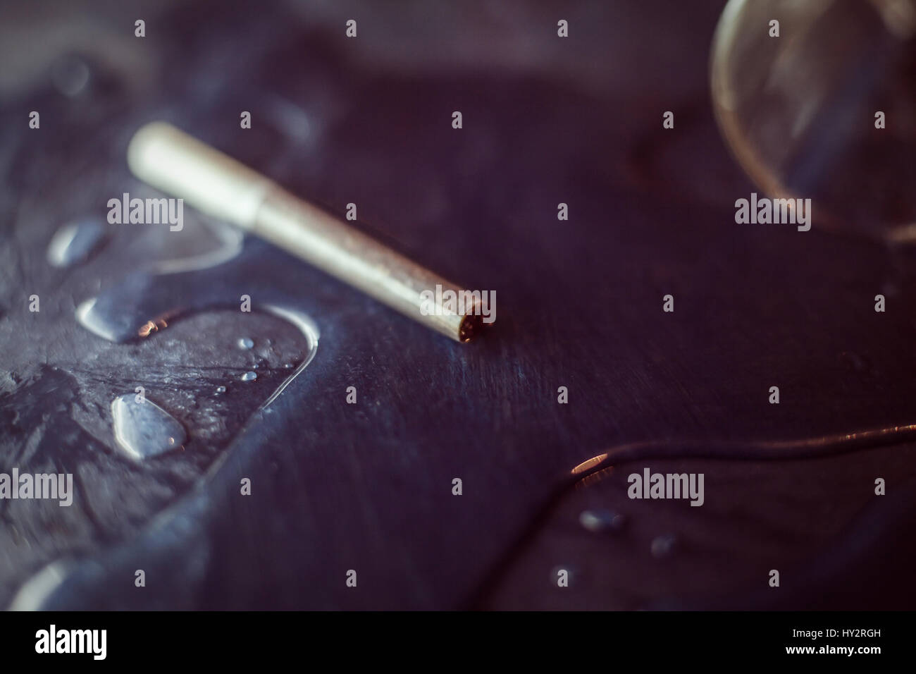 Alcohol and cigarette Stock Photo - Alamy