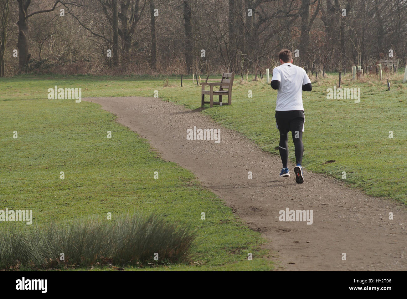 Lone runner hi-res stock photography and images - Alamy