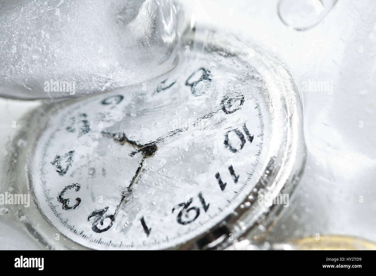 Closeup of pocket watch under frozen water background with ice Stock ...