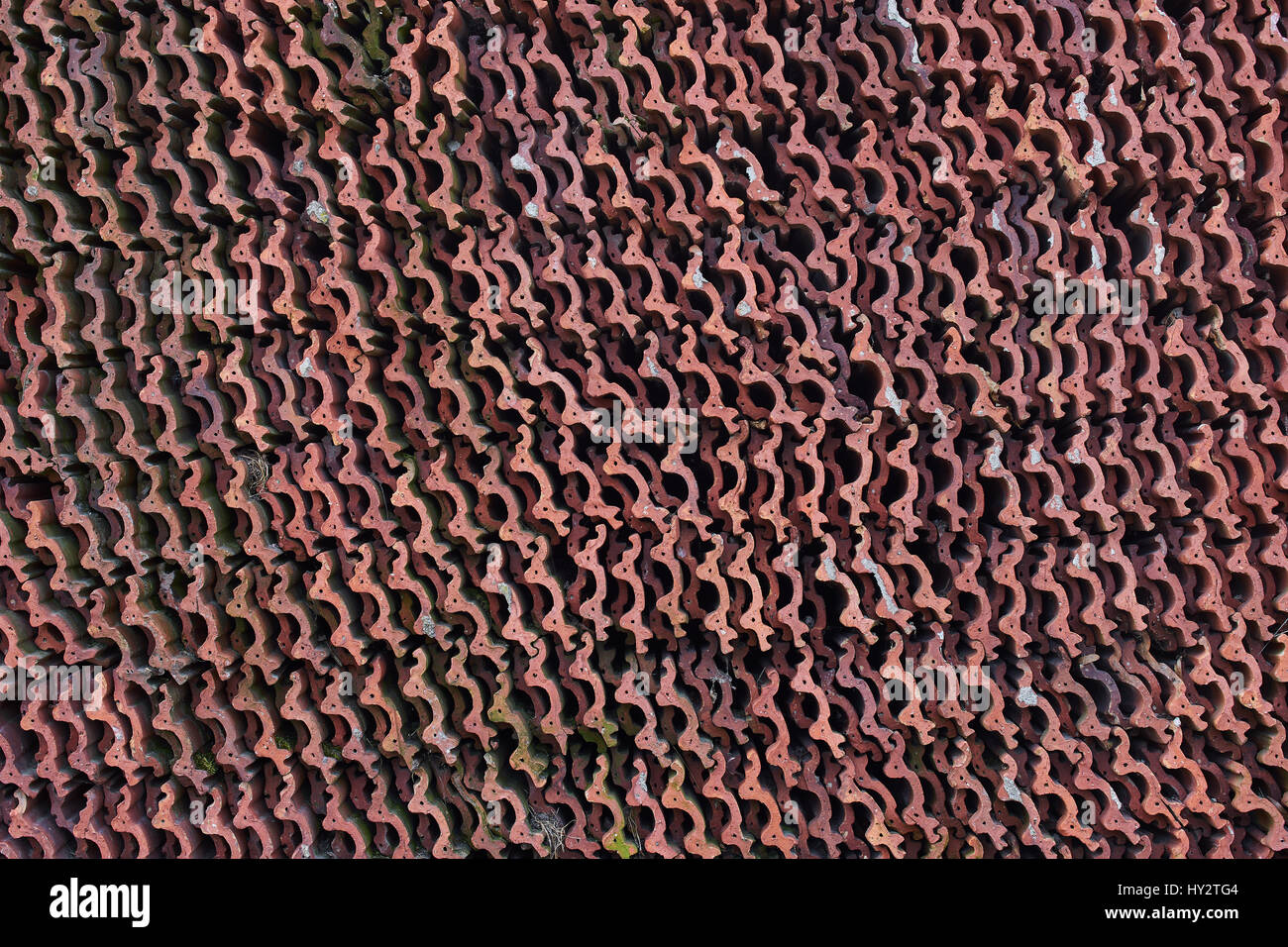 lots of old roof tiles stacked up Stock Photo - Alamy