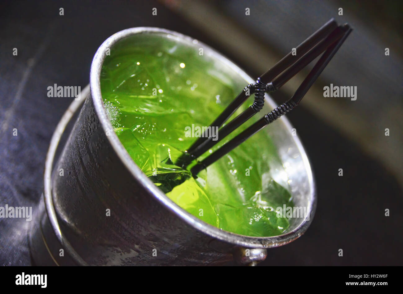 A bucket of melon syrup Stock Photo - Alamy