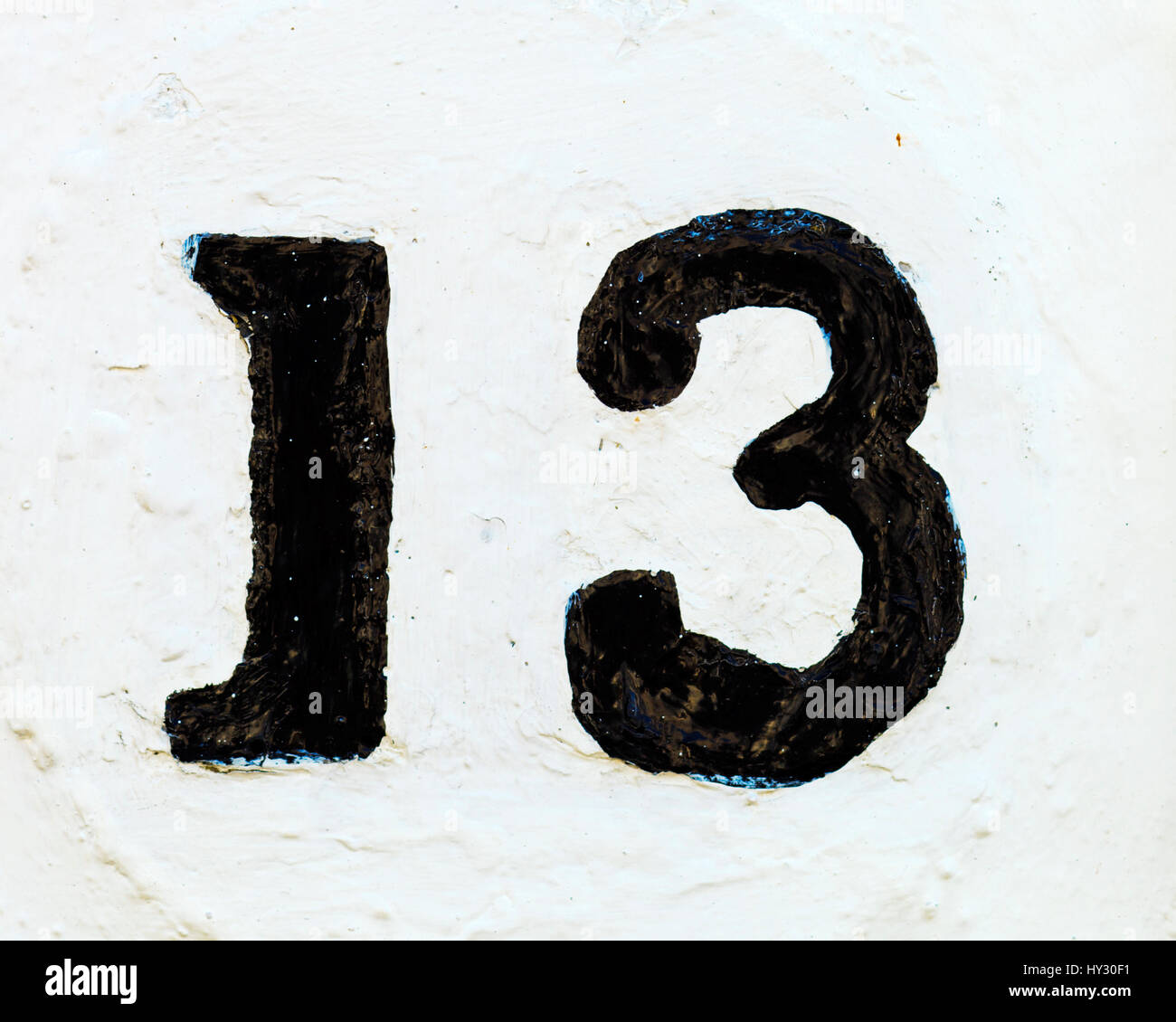 Hand painted number 13 in a street in Brighton Stock Photo - Alamy