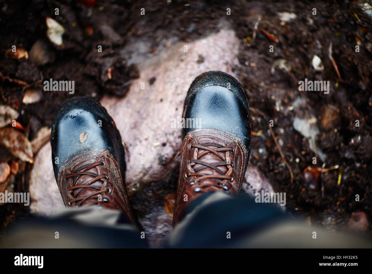 Man in shiny boots standing hi-res stock photography and images - Alamy