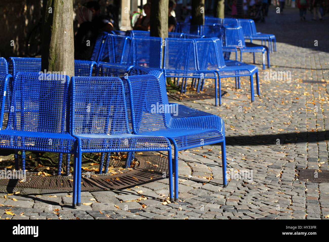 blue round seat bench, chairs Stock Photo - Alamy