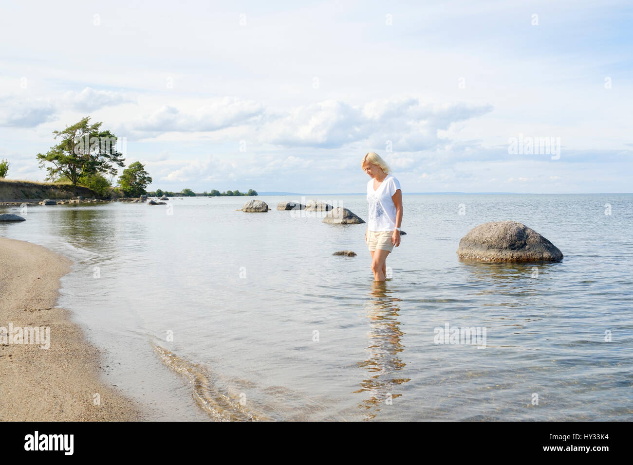 Woman Wading In Water High Resolution Stock Photography and Images - Alamy