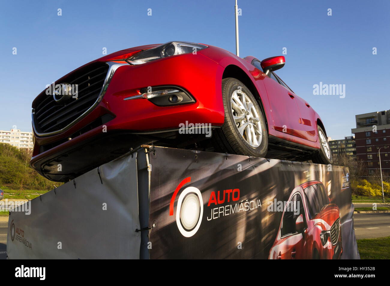 PRAGUE, CZECH REPUBLIC - MARCH 31: Mazda 3 car in front of dealership ...