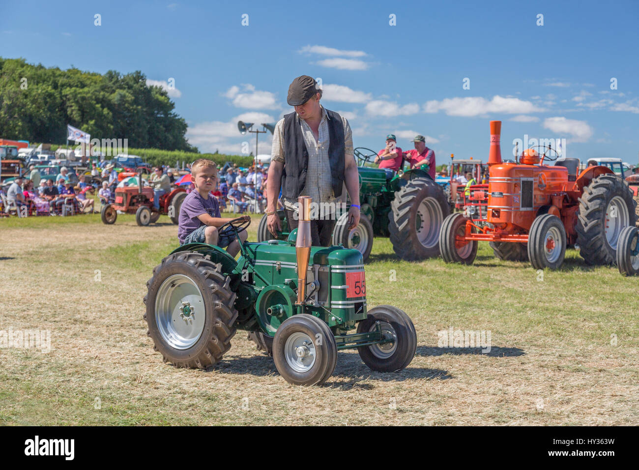 A miniature model of a Field Marshall tractor with miniature driver at ...