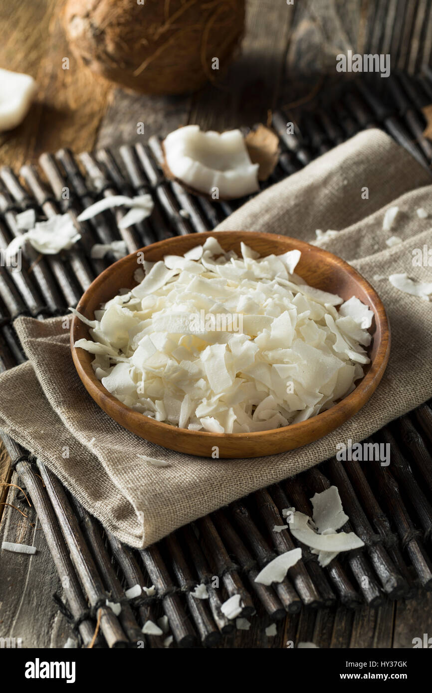 Raw Organic Coconut Flakes in a Bowl for Baking Stock Photo - Alamy