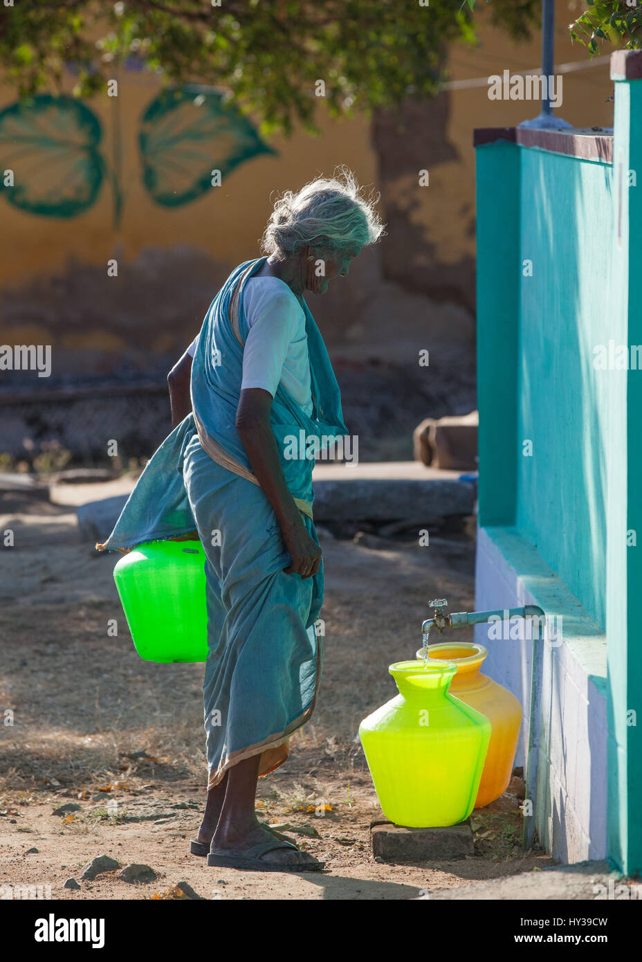 Indian woman drinking water india hi-res stock photography and images ...