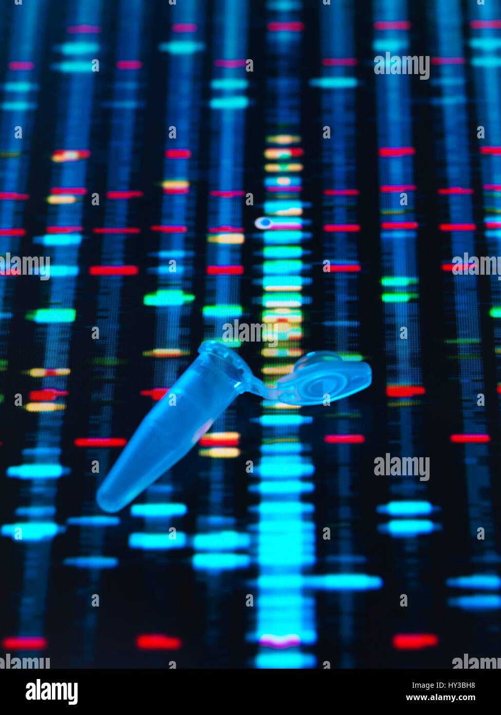 A vial awaiting a DNA (deoxyribonucleic acid) sample for genetic ...