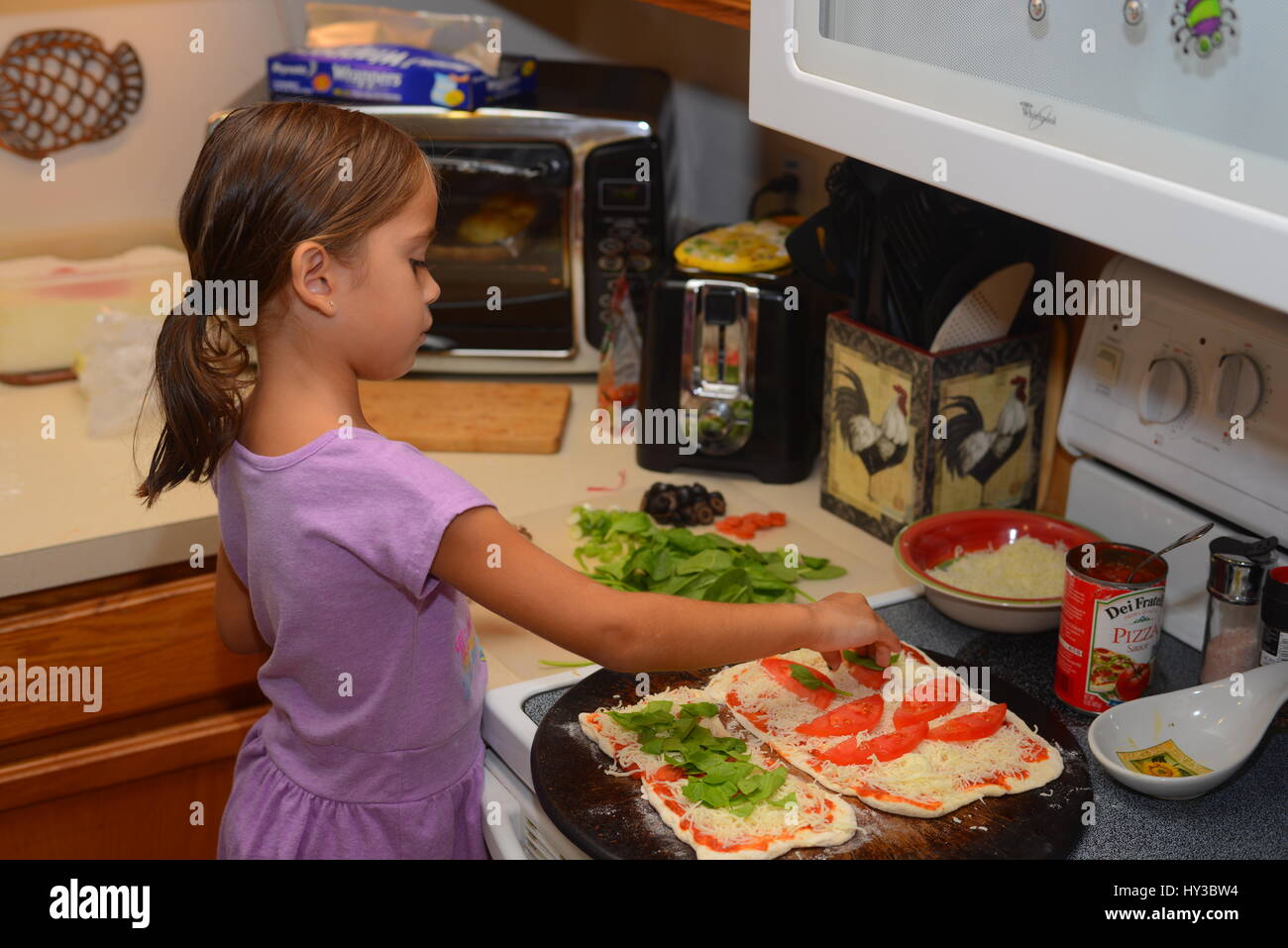 young girl cooking in kitchen Stock Photo - Alamy