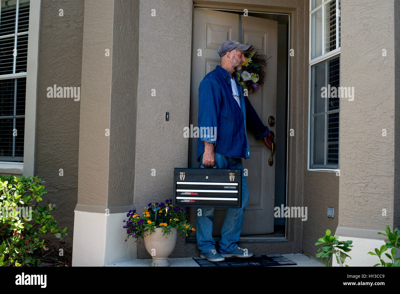 handy man with tools ready for work dorr Stock Photo - Alamy