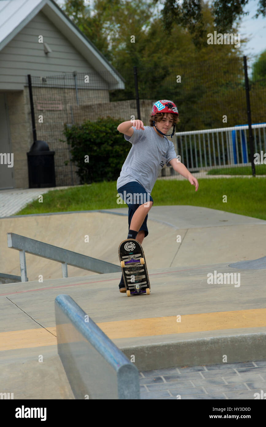 young boy on skate boarding in air balancing t Stock Photo - Alamy