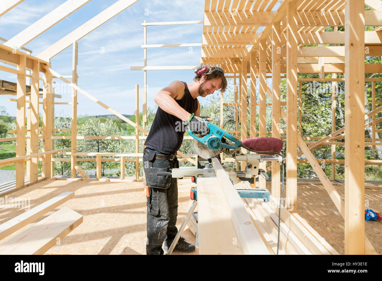 Carpenter construction site cutting wood hi-res stock photography and ...