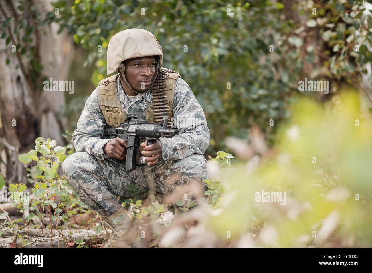 Military soldier guarding with a rifle in boot camp Stock Photo - Alamy