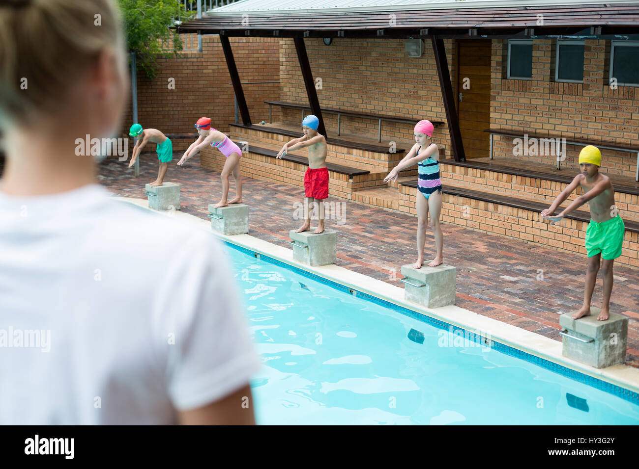 Rear view fit female swimmer hi-res stock photography and images - Alamy
