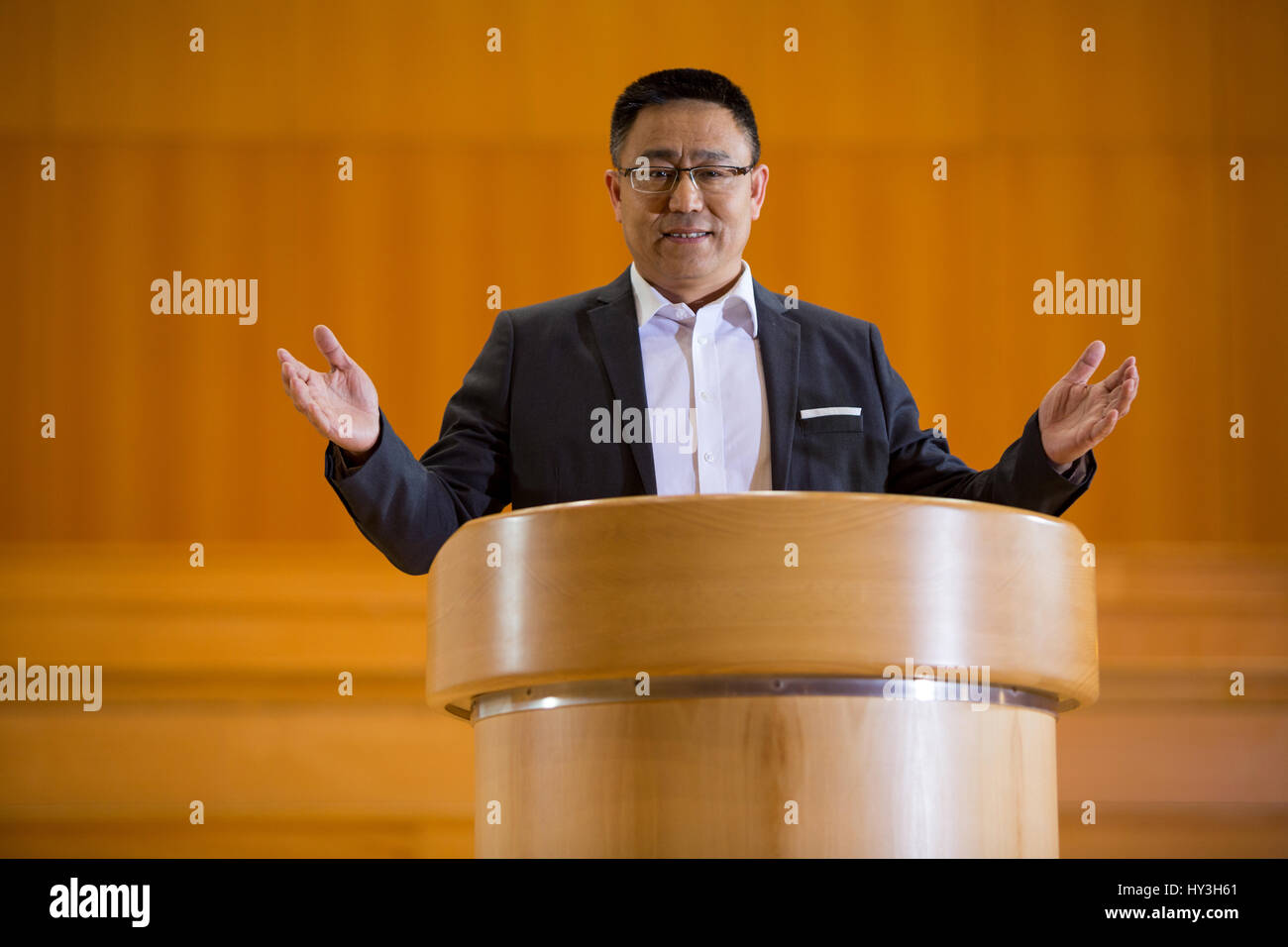 Business executive giving a speech at conference center Stock Photo - Alamy