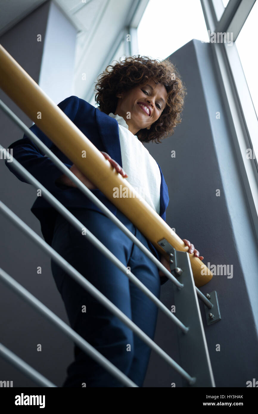 Leaning over railing hi-res stock photography and images - Alamy