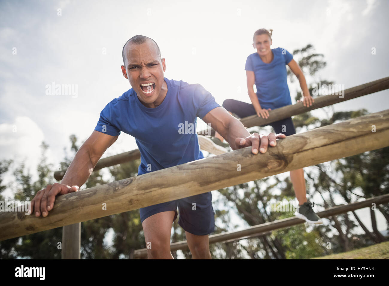 Male athlete jumping over obstacle people hi-res stock photography and ...