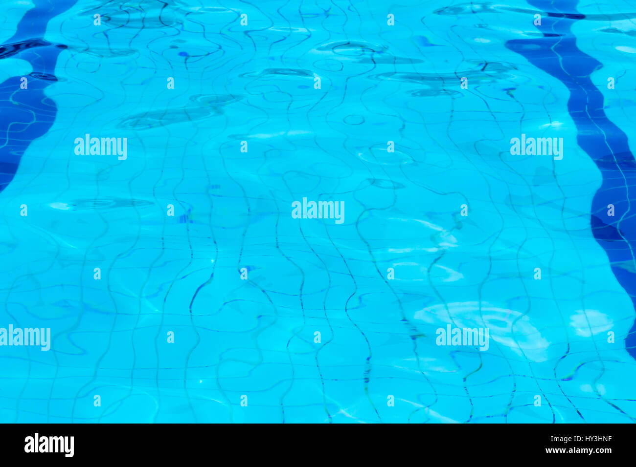Blue ripple water in swimming pool Stock Photo - Alamy