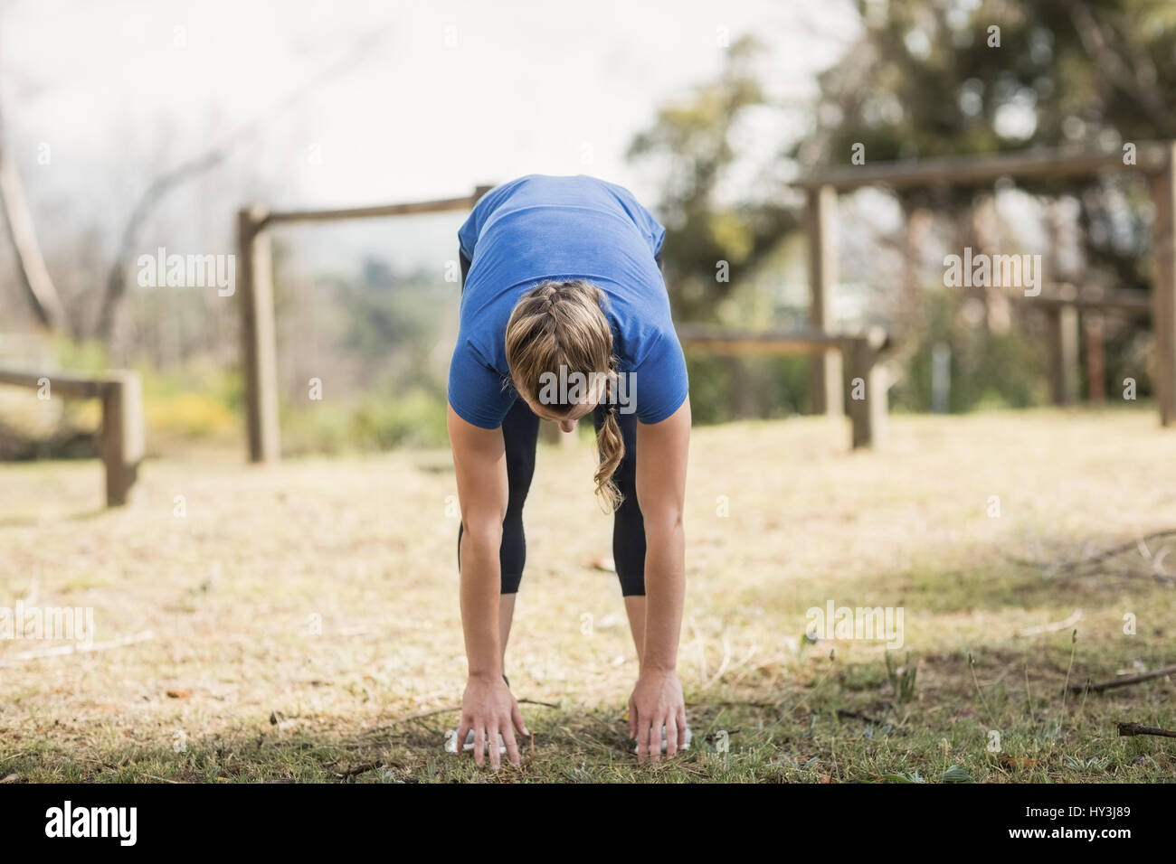 Fit woman exercising in boot camp on a sunny day Stock Photo - Alamy