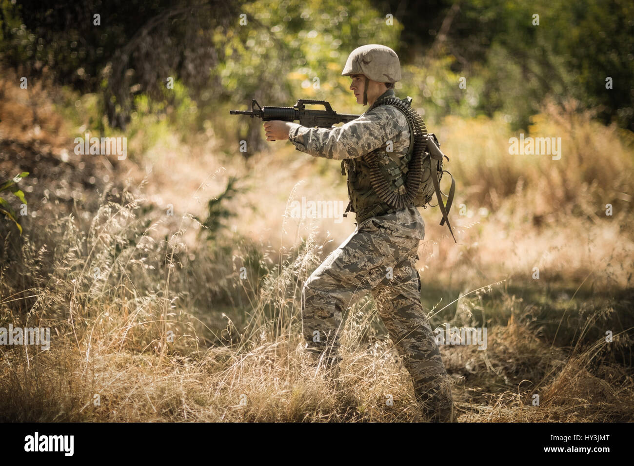 Military soldier aiming with a rifle in boot camp Stock Photo - Alamy