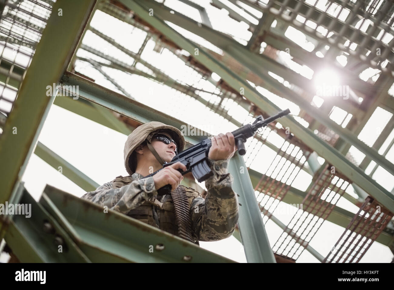 Military soldier guarding with a rifle in boot camp Stock Photo - Alamy