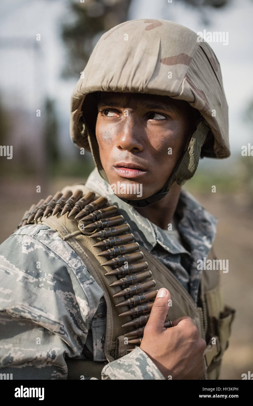 Military soldier during training exercise with weapon at boot camp ...