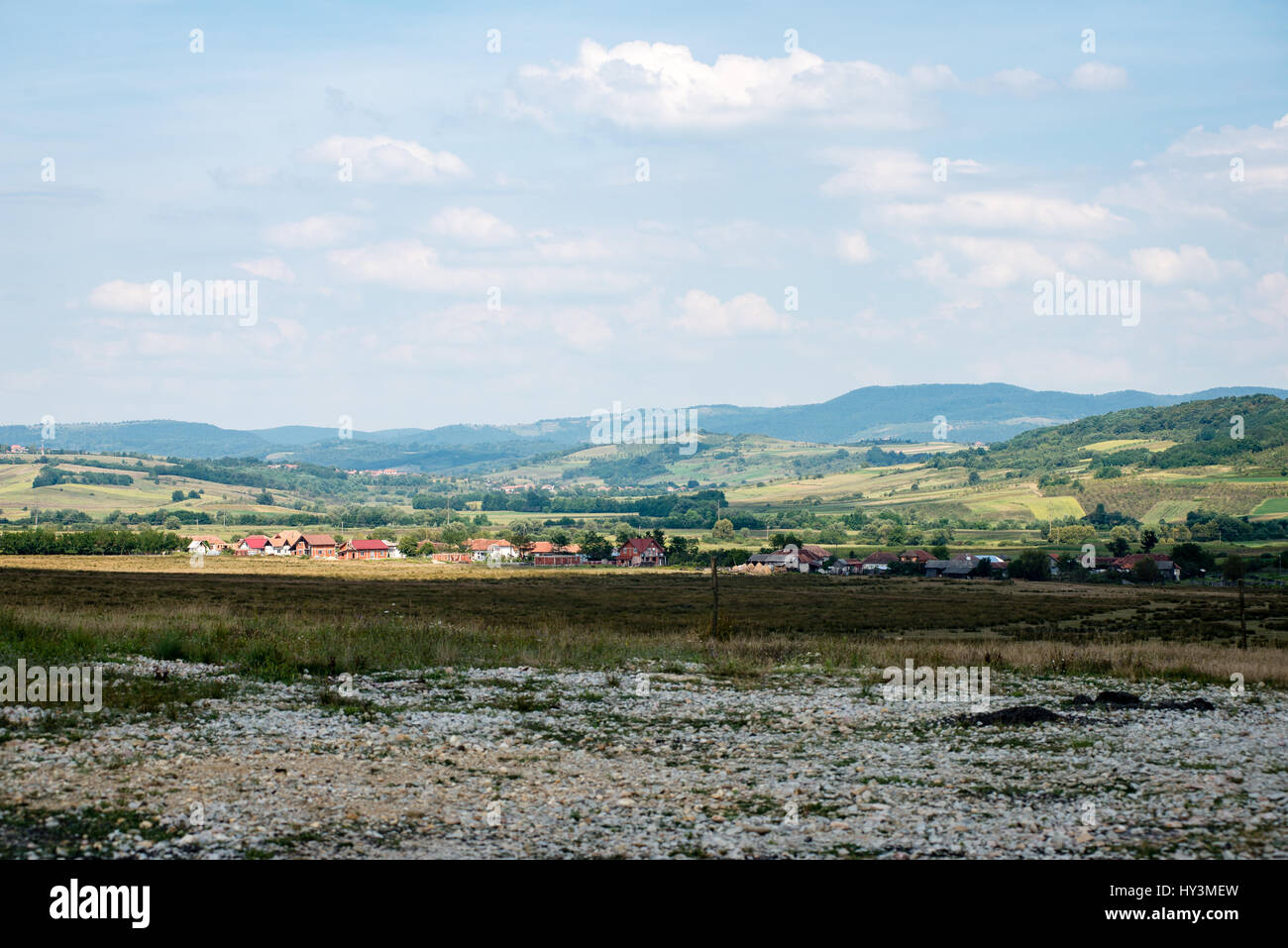 small mountain city view in romania from above in autumn with colorful ...