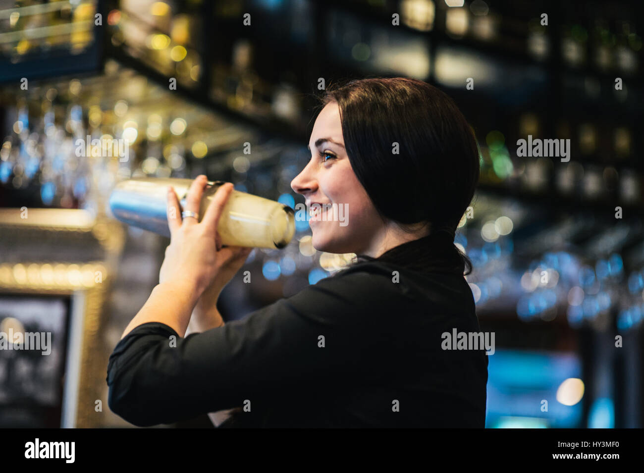 Cocktail waitress hi-res stock photography and images - Alamy