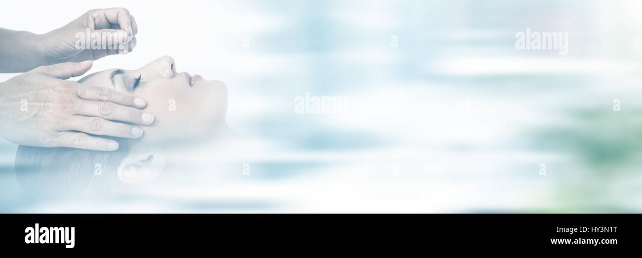 Relaxed woman receiving an acupuncture treatment in a health spa Stock ...
