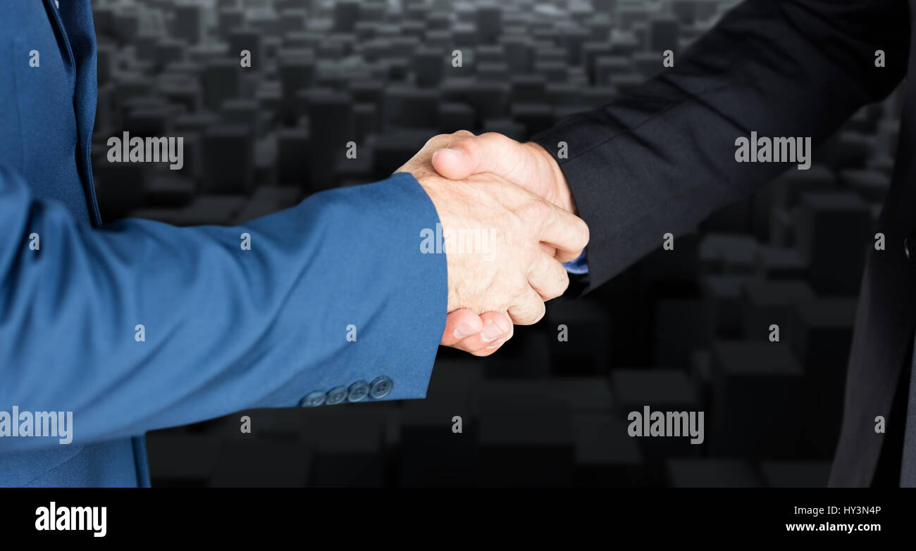 Male executives shaking hands against computer graphic image of black ...