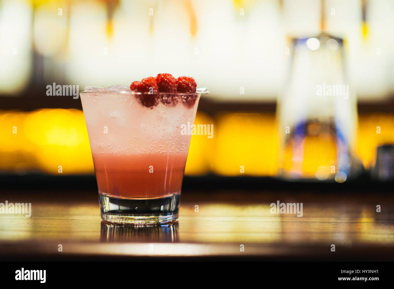 Raspberry Cocktail in a Short Glass Stock Photo - Alamy
