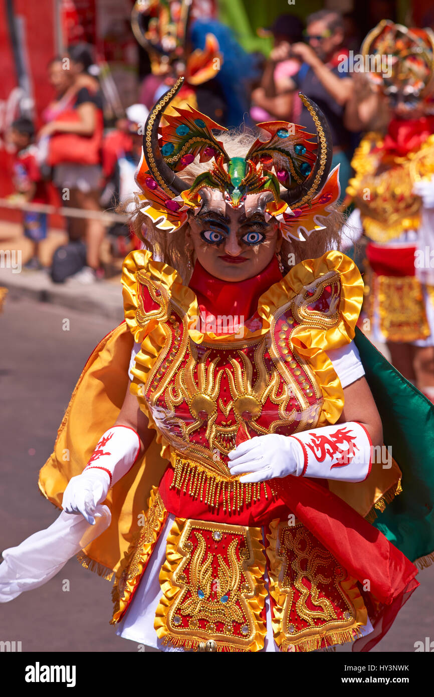 Masked man performing the Diablada (dance of the devil) as part of the ...