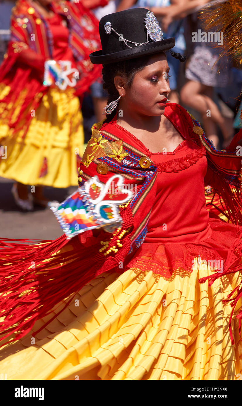 Lady in traditional Andean costume performing at the annual Carnaval ...