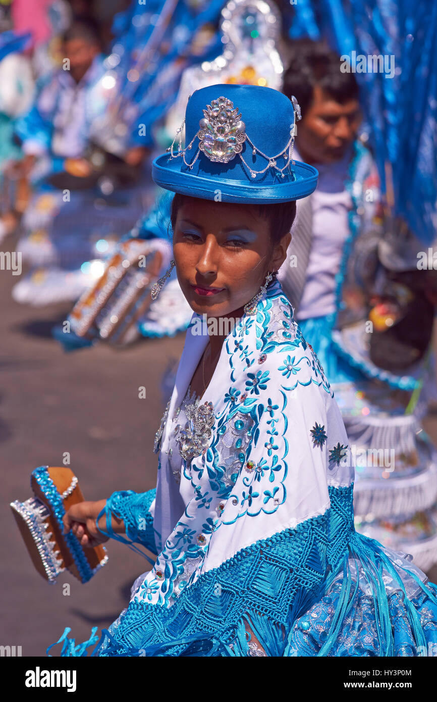 Female dancer in a Morenada dance group performing a traditional ritual ...
