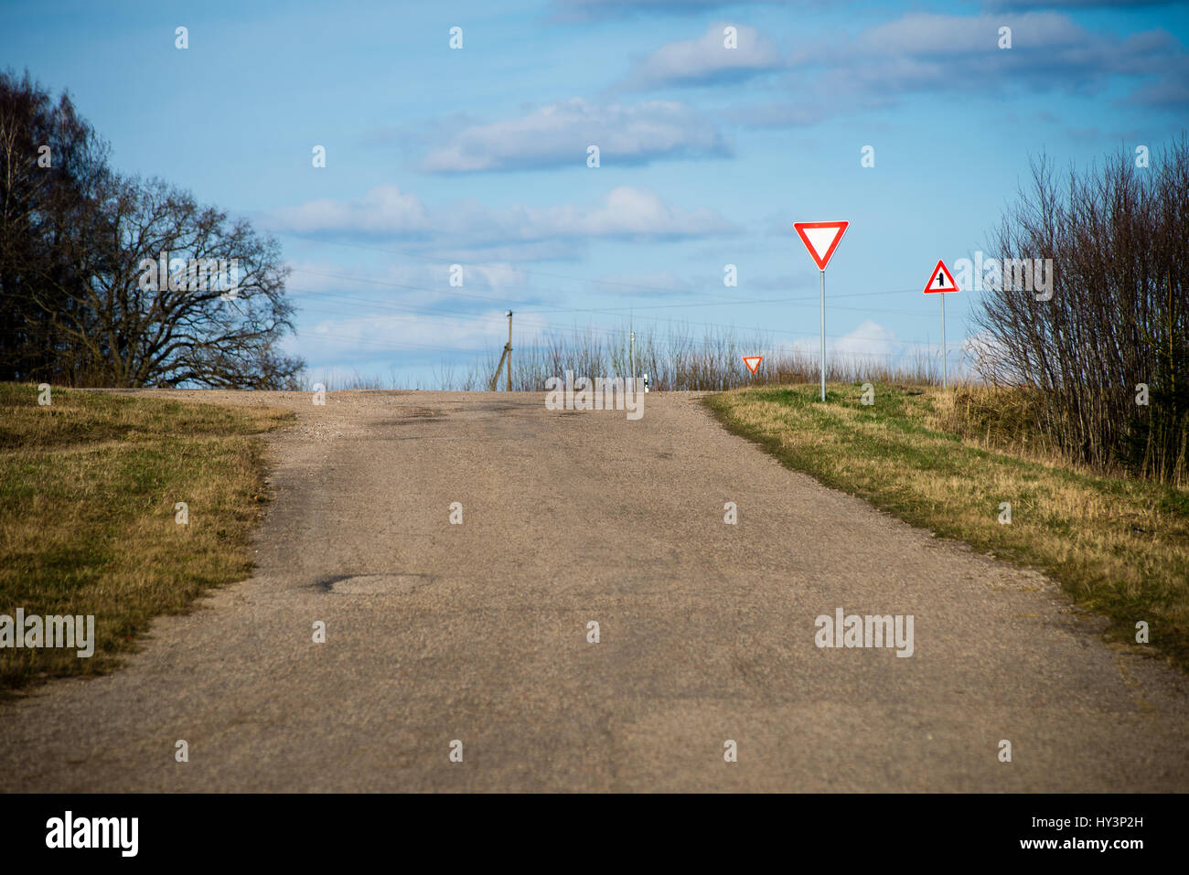 simple country road in summer at countryside with trees around Stock ...