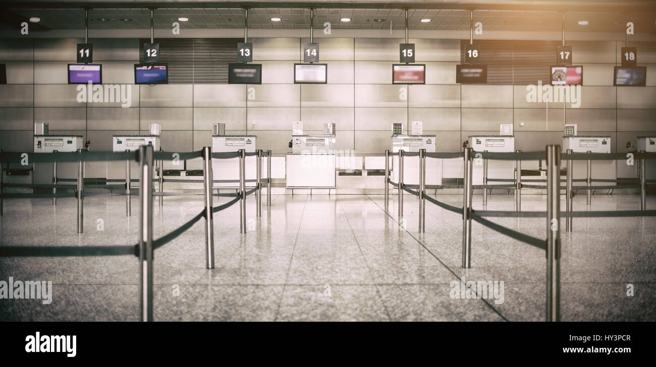 Empty airplane counter at airport Stock Photo - Alamy