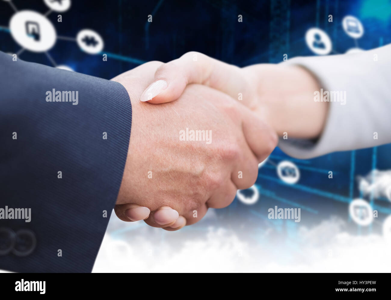 Composite image of business people doing handshake Stock Photo - Alamy