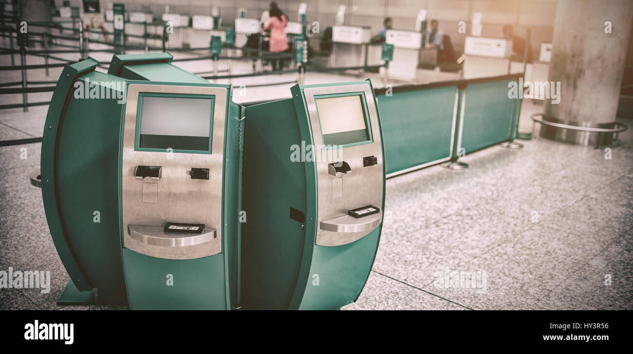 Quick check-in counter at airport Stock Photo - Alamy