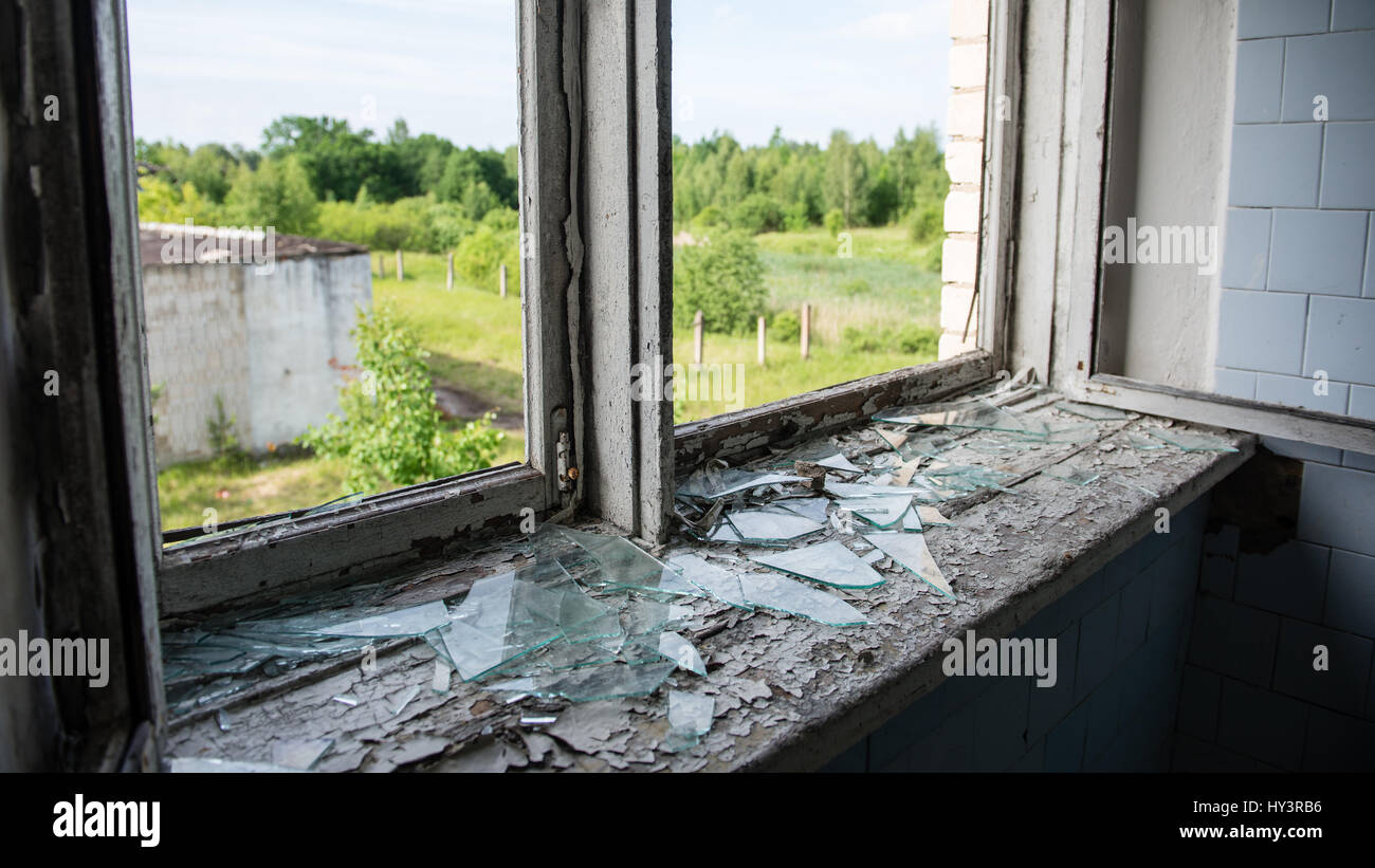 broken windows with smashed glass and dust Stock Photo - Alamy