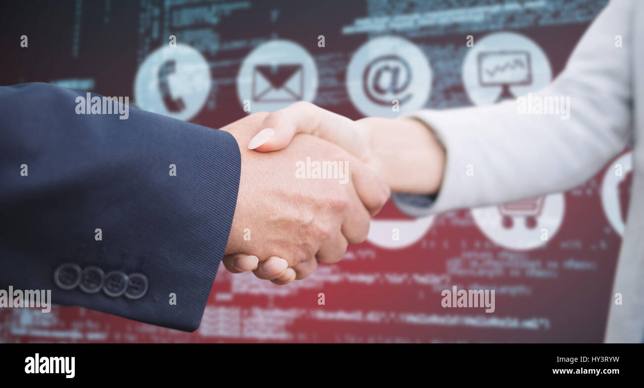 Corporate people doing handshake against composite image of blue codes ...