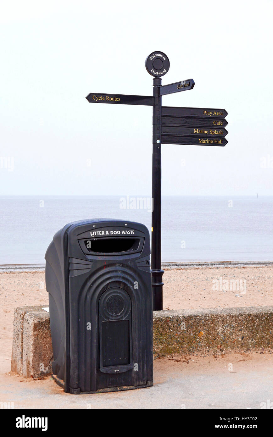 Litter bin and tourist information direction sign Stock Photo - Alamy