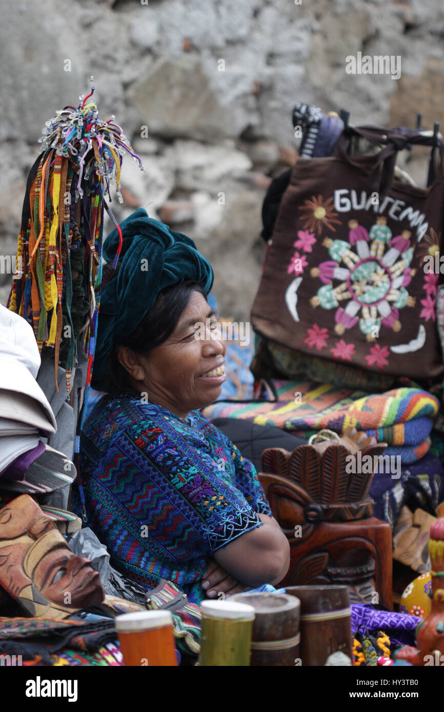 Beautiful colorful people in Guatemala Antigua market selling ...