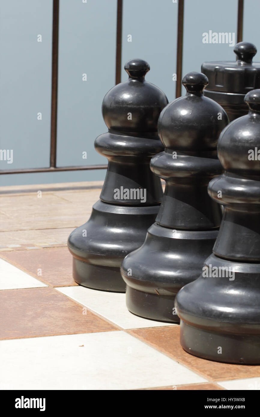 Chess figure human human size Stock Photo - Alamy