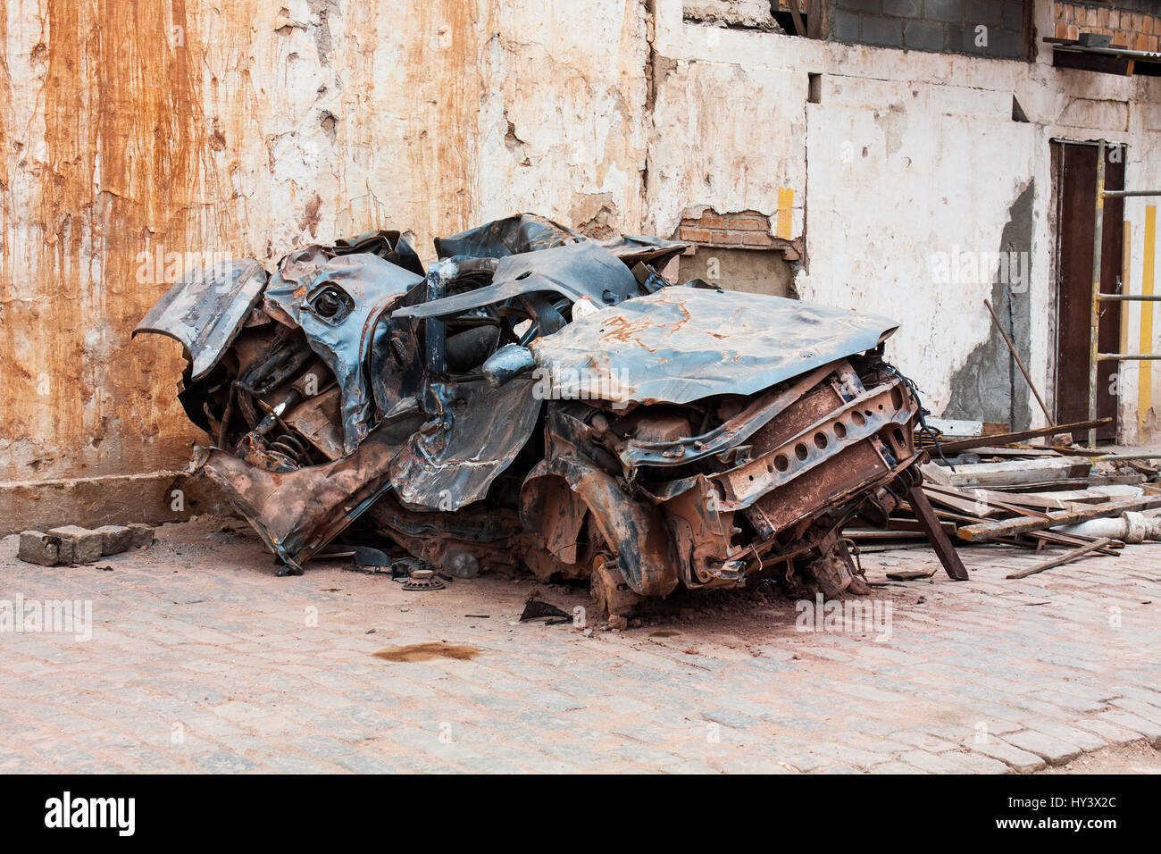 Crashed car in flood disaster. This car was destroyed during a strong ...