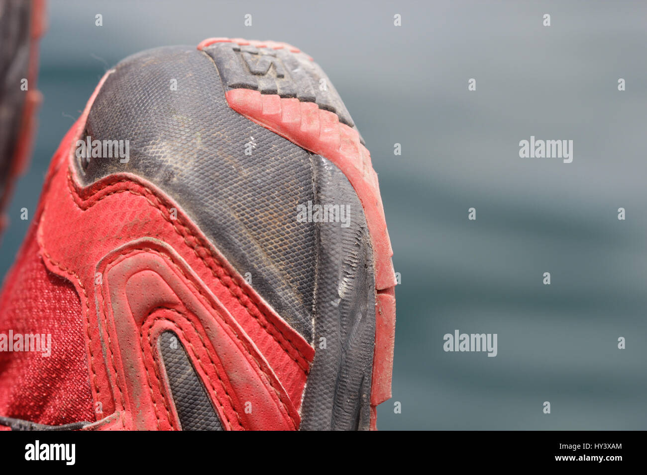 Hiking new modern shoe tip after a long hike Stock Photo - Alamy