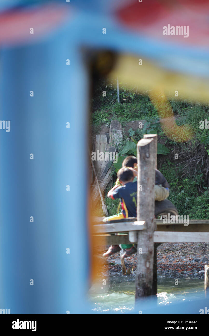 Small wooden handmade harbor for boats port Stock Photo - Alamy