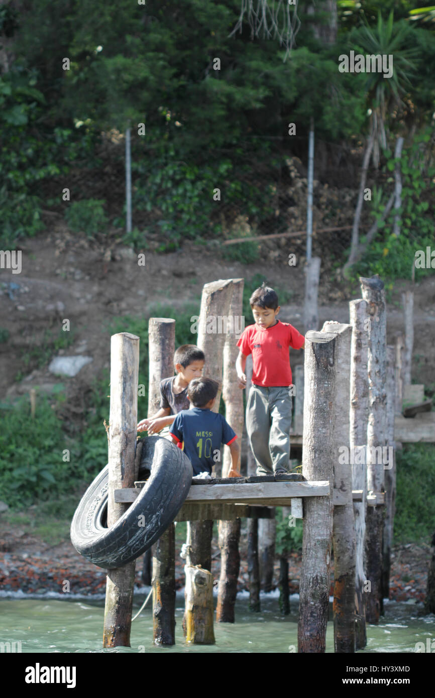 Small wooden handmade harbor for boats port Stock Photo - Alamy